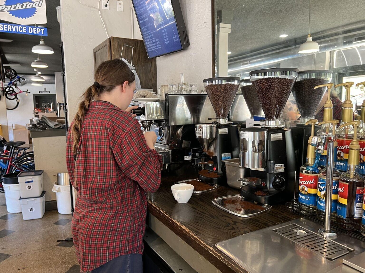 Cursed Bikes & Coffee blends biking culture and espresso in University ...